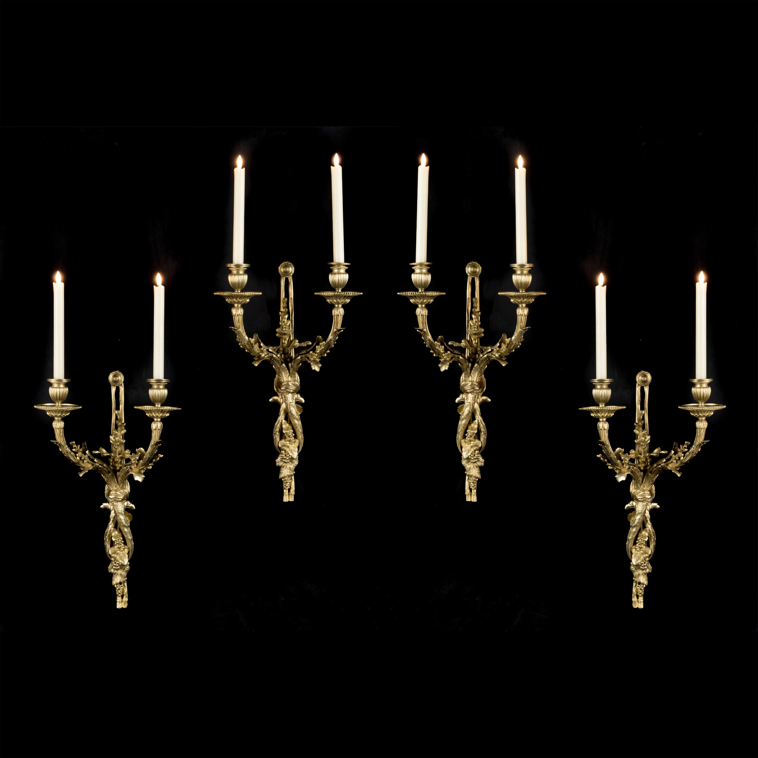 A Set of Four Ormolu Twin-Light Appliques In the Louis XVI Style