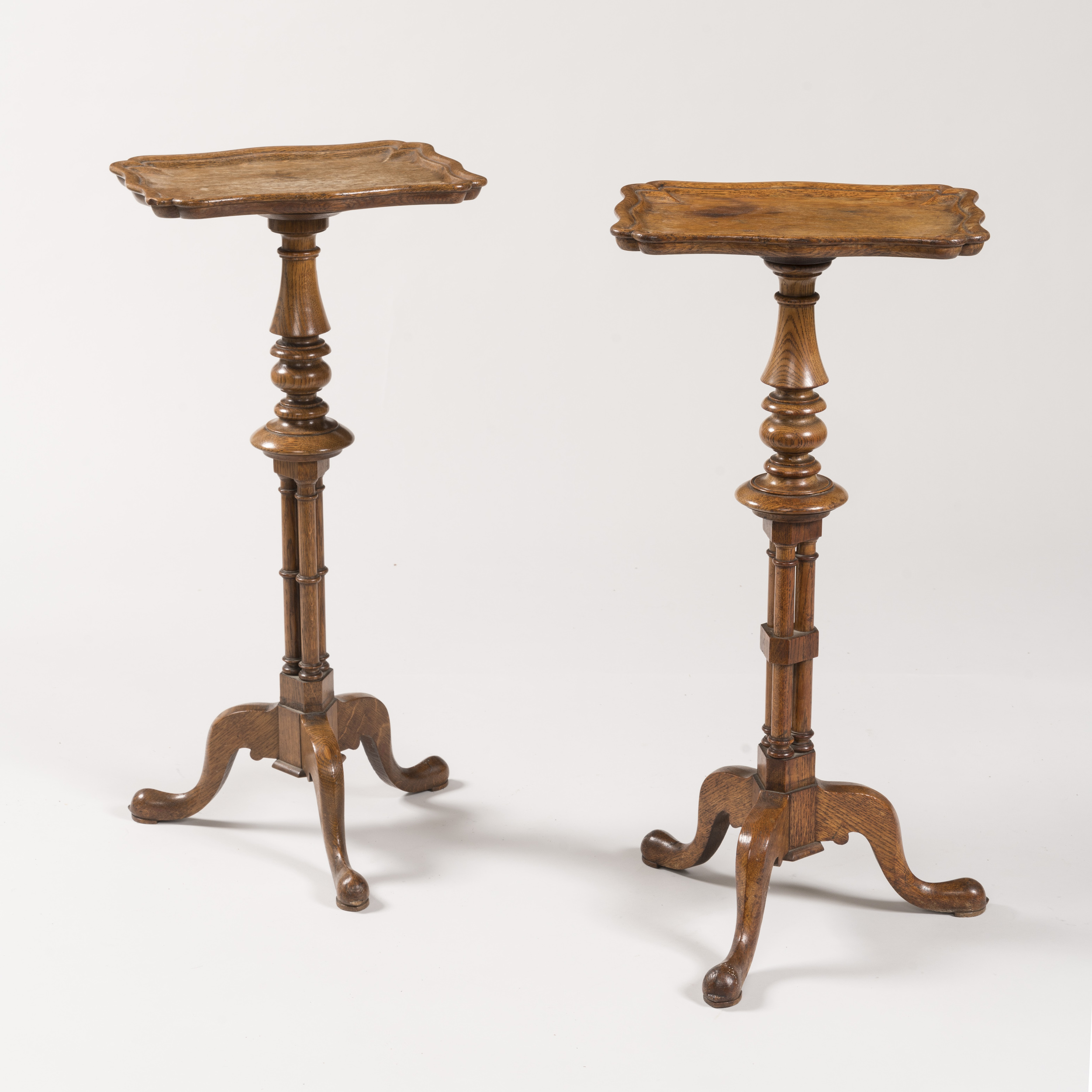 A Matched Pair of Oak Tripod Tables